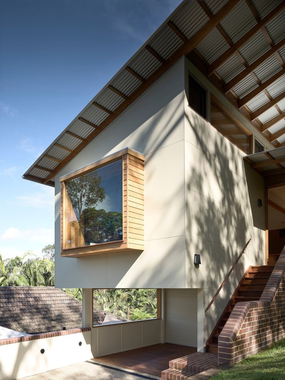 Hillside L-shaped House With Passive Solar Design Amidst Beautiful ...