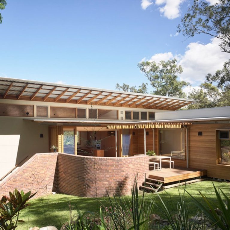 Hillside L-shaped House With Passive Solar Design Amidst Beautiful ...
