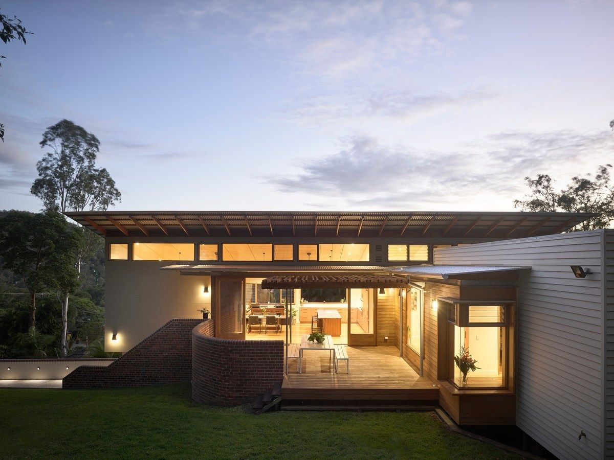 Hillside L-shaped House With Passive Solar Design Amidst Beautiful ...